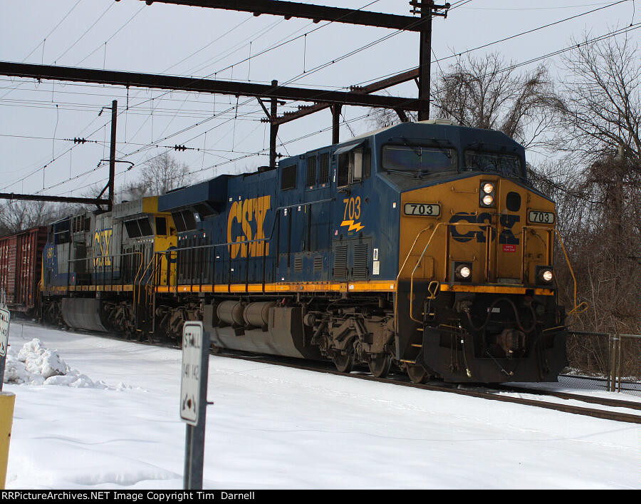 CSX 703, 647 on Q410